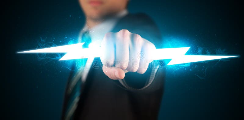 Business Man Holding Glowing Lightning Bolt in His Hands Stock Image ...