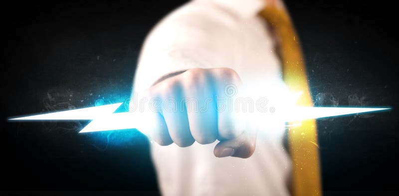 Business Man Holding Glowing Lightning Bolt in His Hands Stock Photo ...