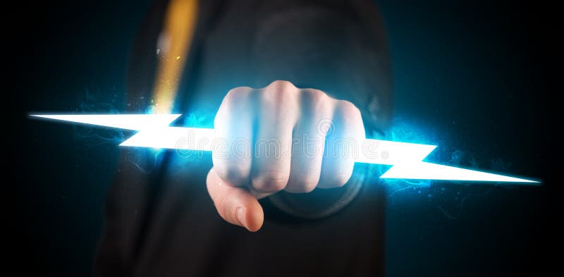 Business Man Holding Glowing Lightning Bolt in His Hands Stock Image ...