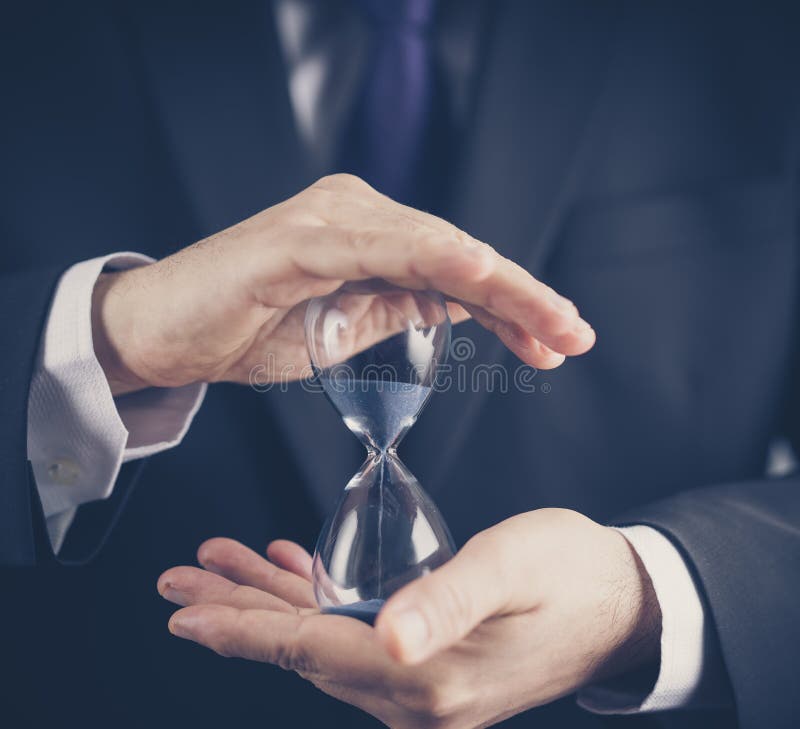 Business Man Holding Hourglass in Hand Stock Image - Image of hand ...