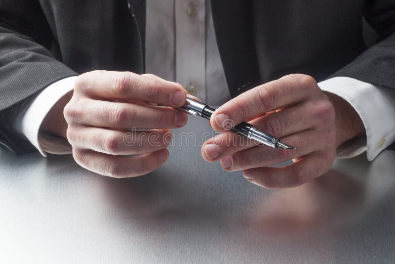 Business Man Holding a Ink Pen at the Office Stock Photo - Image of ...