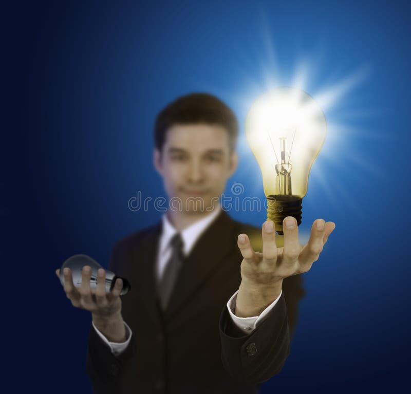 Business Man Holding Light Bulb Stock Image - Image of modern, employee ...