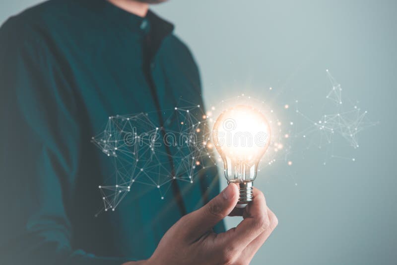 Business Man Holding Light Bulb Stock Photo - Image of innovation ...