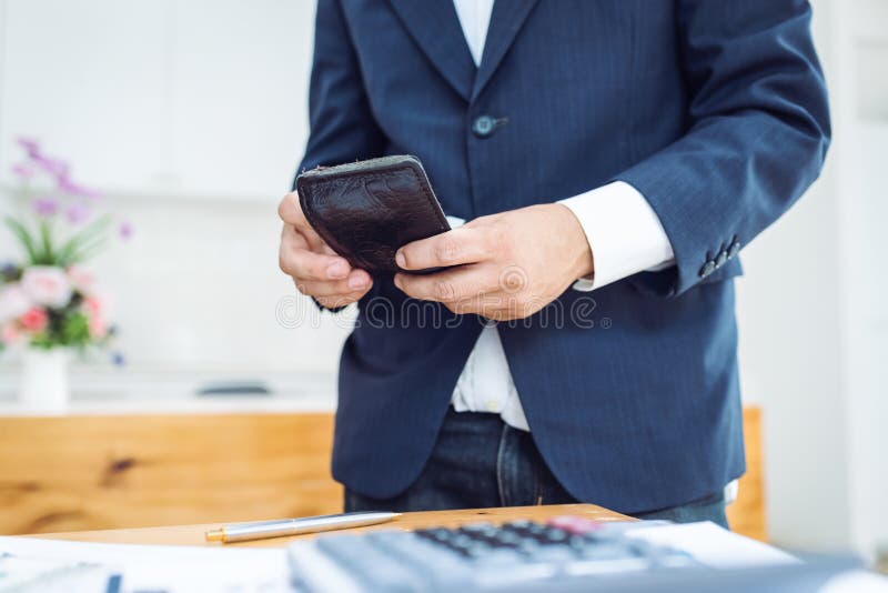 Business Man Holding Men Wallet while Standing Stock Image - Image of ...