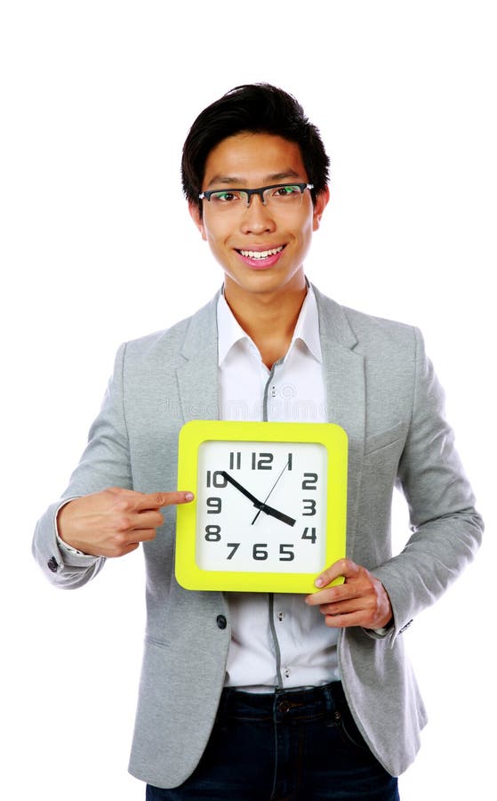 Business Man Holding and Pointing To a Big Clock Stock Image - Image of ...