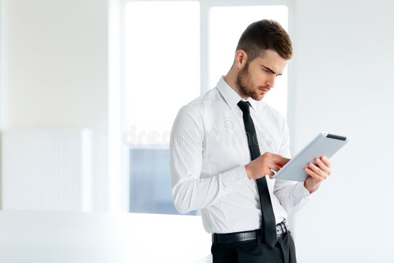 Business Man Holding a Tablet Computer. Stock Photo - Image of suit ...