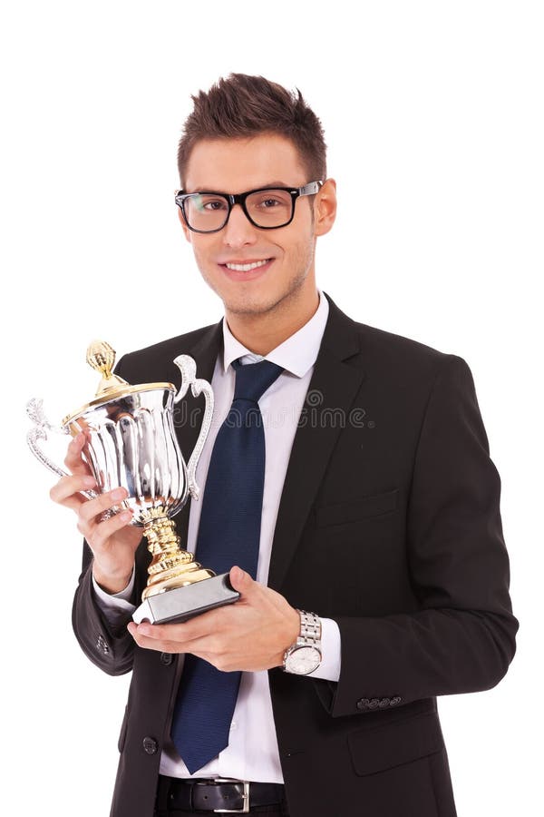 Business Man Holding A Trophy Stock Photo - Image of descent ...