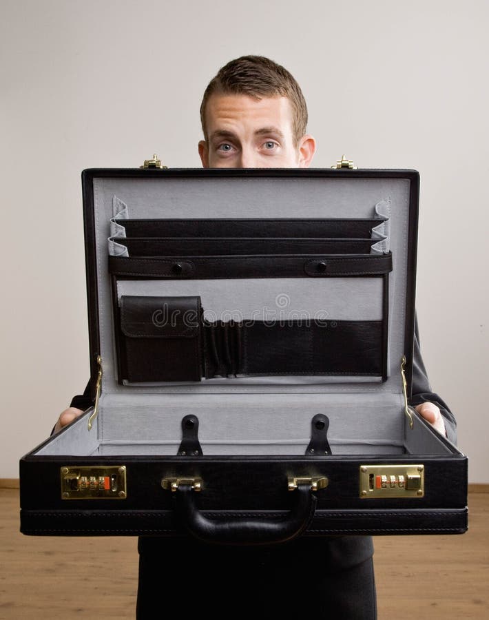 Business Man Holds Up Empty Brief Case Stock Image - Image of open ...