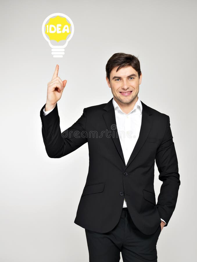 Business Man with an Idea Bulb Stock Photo - Image of decision, male ...