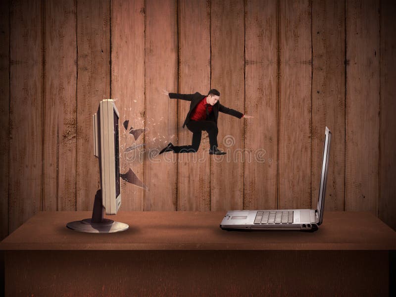 Business Man Jumping from Desktop Computer To Laptop Stock Photo ...
