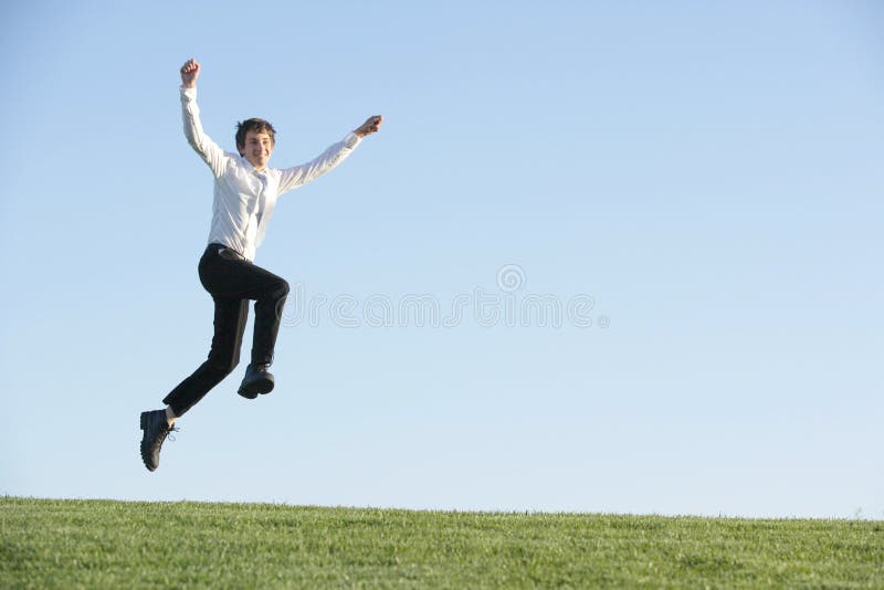 A Business Man Jumping for Joy Stock Photo - Image of spring ...