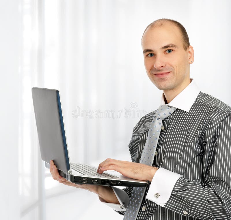 Business man with laptop stock image. Image of corporate - 24696953