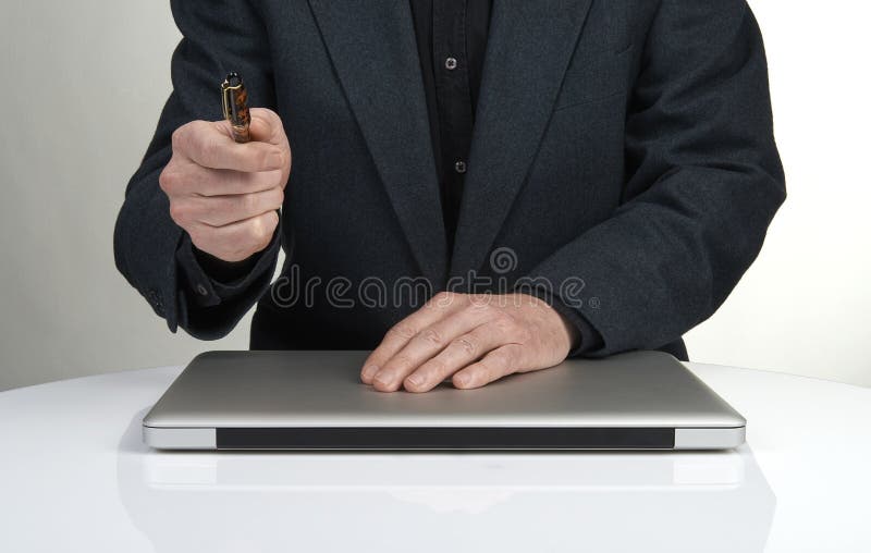 Business Man with Laptop Pointing a Pen Stock Image - Image of table ...