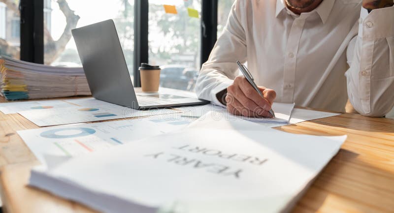Business Man on Laptop Work Inside Office, Taking Notes on the Paper ...