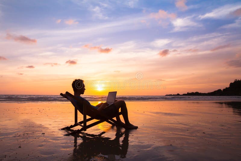 The laptop on a beach stock photo. Image of lagoon, holiday - 21510506