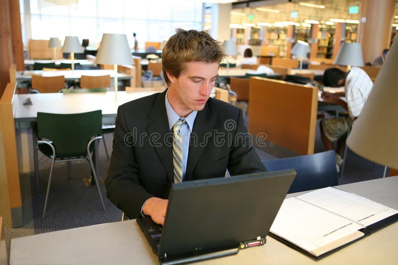Business Man in Library stock photo. Image of serious - 1594890