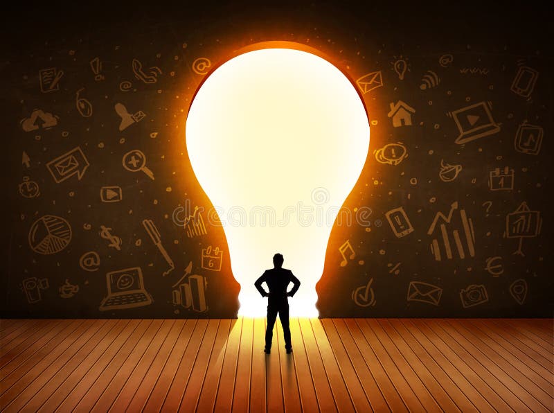 Business Man Looking at Bright Light Bulb in the Wall Stock Image ...