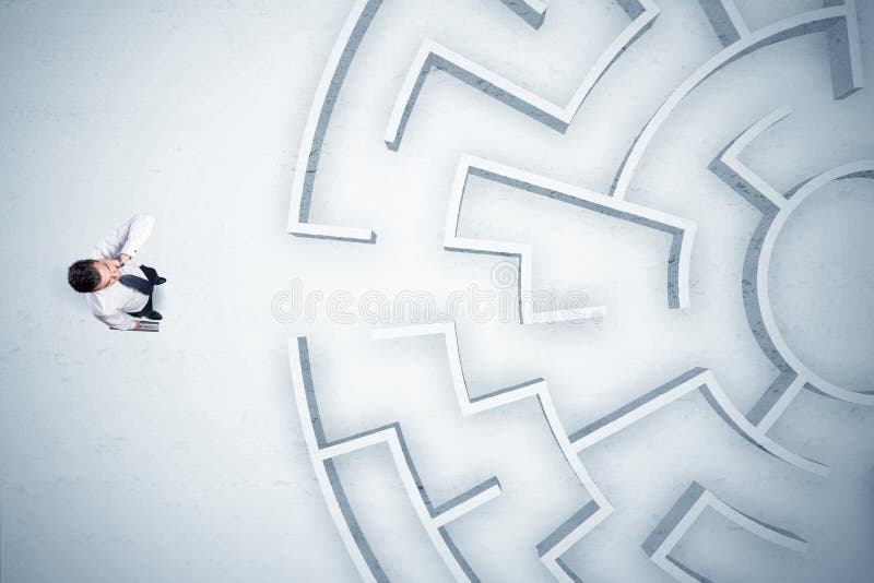 Business Man Looking at Circular Maze with Nowhere To Go Stock ...
