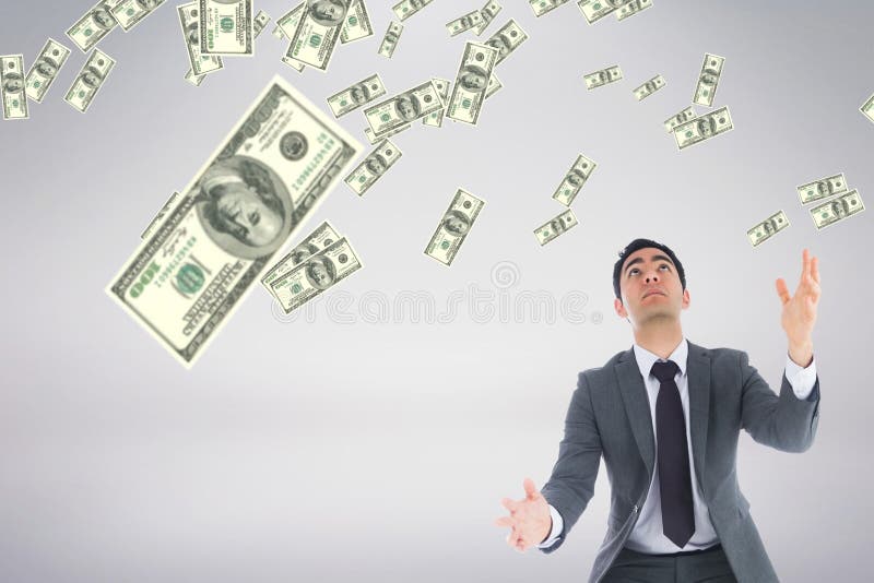 Excited Business Man Looking at Money Rain Against Grey Background ...