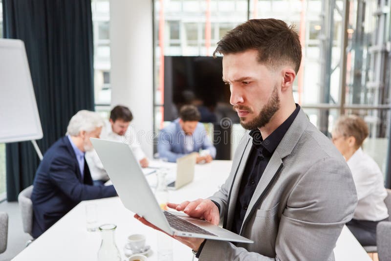 Business Man Makes Critical Research on Laptop Stock Image - Image of ...