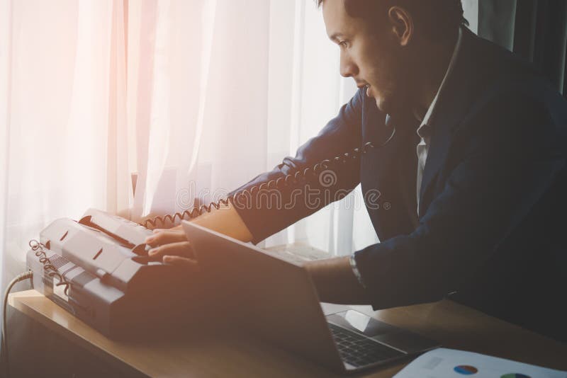 Business Man Making Call in on Fax Phone Landline Stock Photo - Image ...