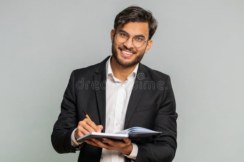 Business Man Making Notes Writing Down Thoughts with Pen into Notepad ...
