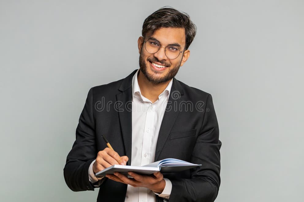 Business Man Making Notes Writing Down Thoughts with Pen into Notepad ...