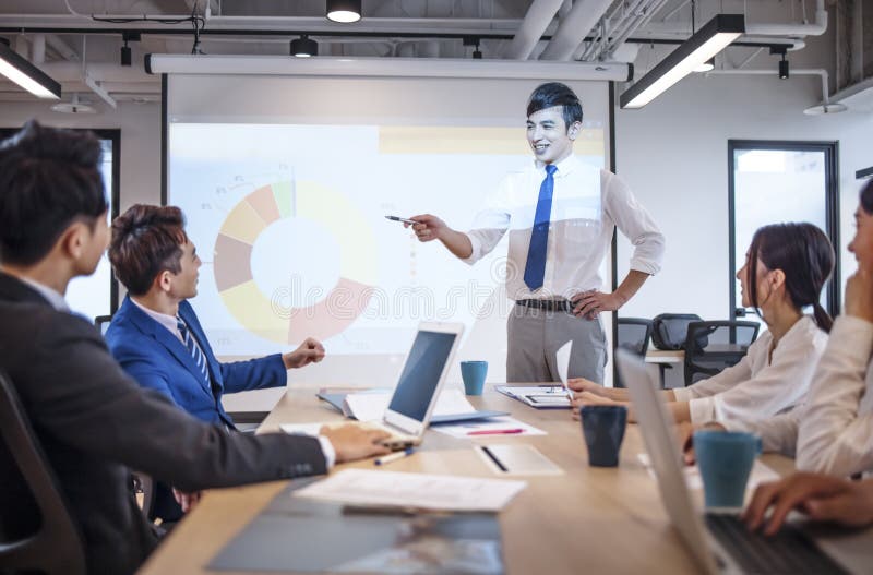 Man Making Presentation on Monitor To the People Stock Image - Image of ...
