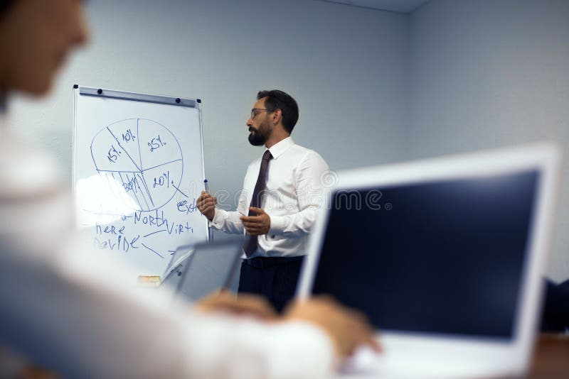 Business Man Making a Presentation in Office Stock Photo - Image of ...