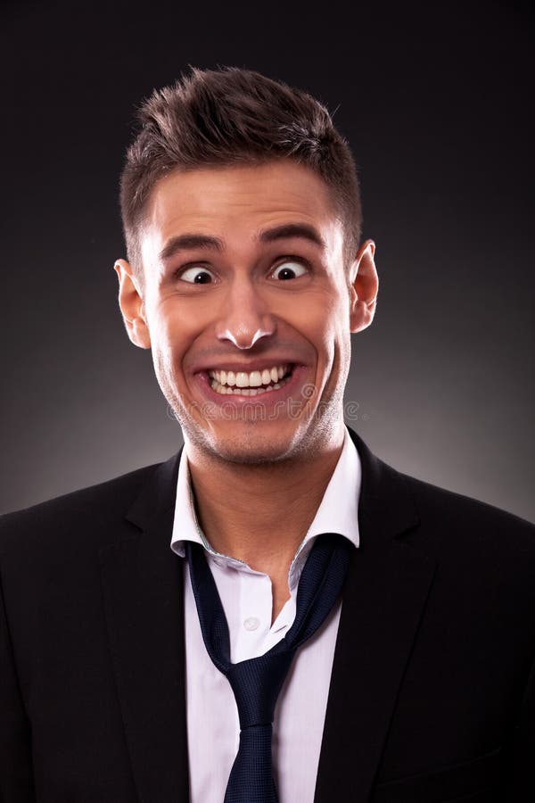 Business Man Making a Silly Face Stock Image - Image of necktie, ears ...