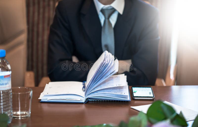 Business Man with Notepad and Phone Stock Photo - Image of phone ...