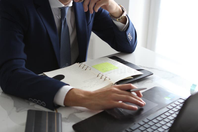 Business Man in the Office Works and Analyzes Financial Data Stock ...