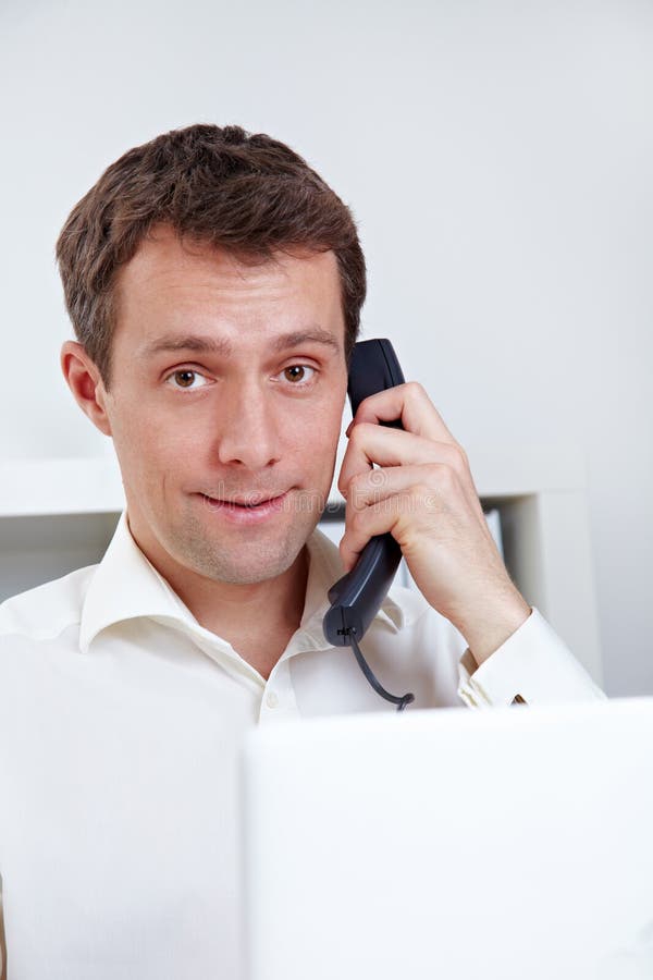Business man on the phone stock photo. Image of place - 25536482