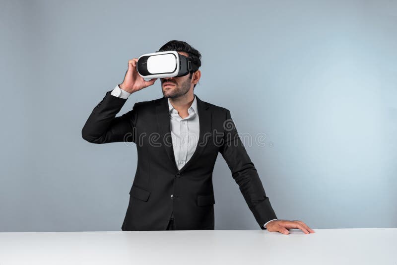 Skilled Business Man Planning Financial Plan while Using VR Goggle ...