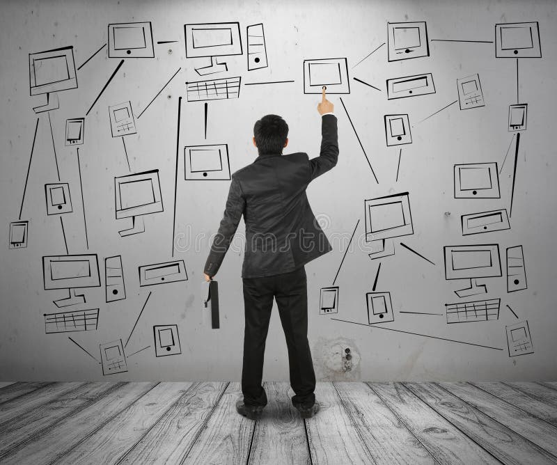 Business Man Pointing at Computer To Share Concept on Wall Stock Photo ...