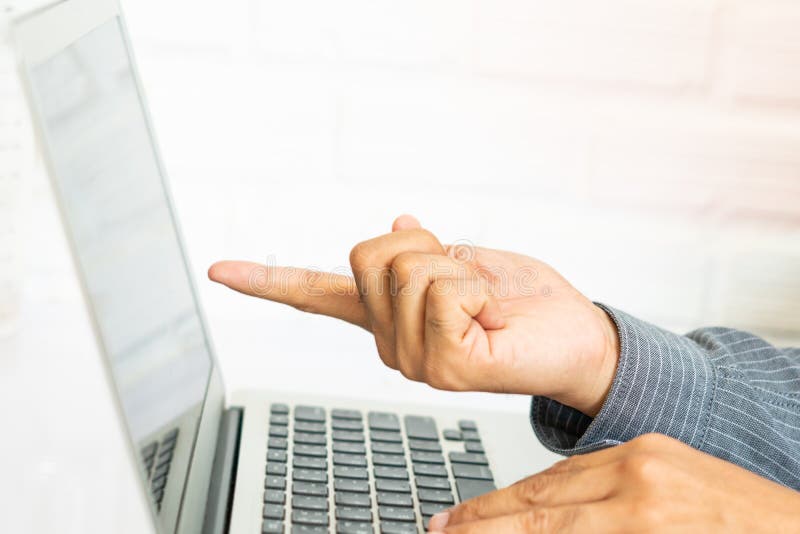 Business Man Pointing at Laptop Screen on Workplace Stock Image - Image ...