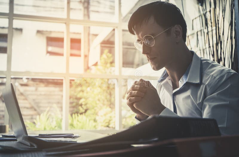 Business Man Praying for Business on Computer Stock Photo - Image of ...
