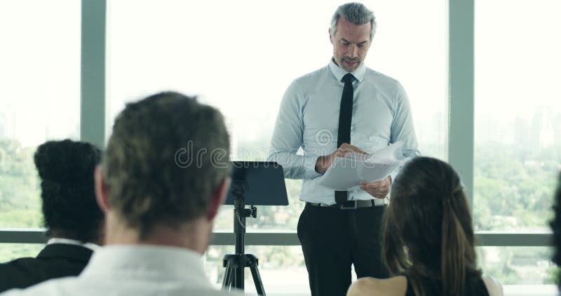 Business Man, Presenter and Document at Conference for Questions ...