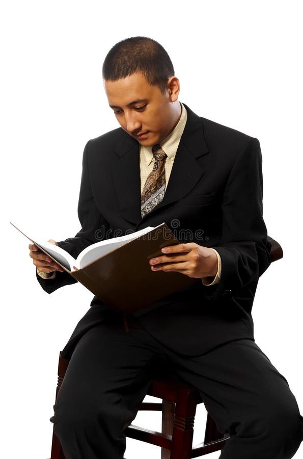 Business Man Reading Book stock image. Image of suit - 13400629
