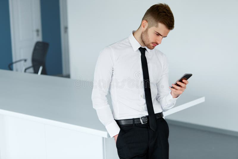 Business Man Reading Something on the Screen of His Cell Phone Stock ...