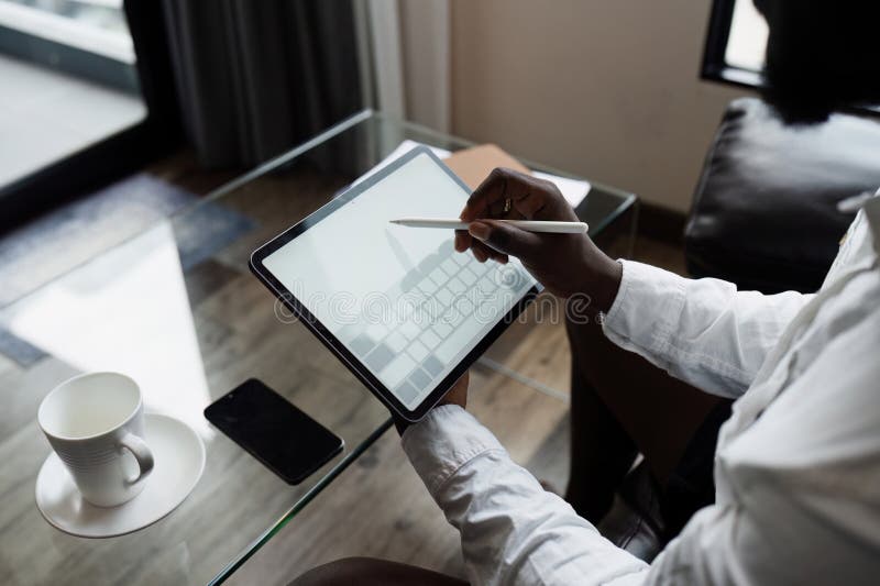 Business Man Remote Work with Tablet in Modern Home Office with Coffee ...