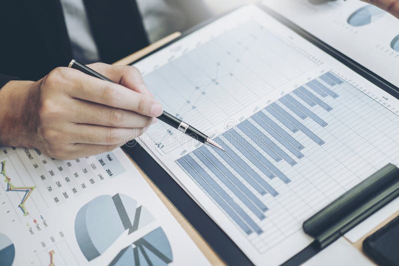 Business Man with Report Chart in Office Planning New Business Project ...