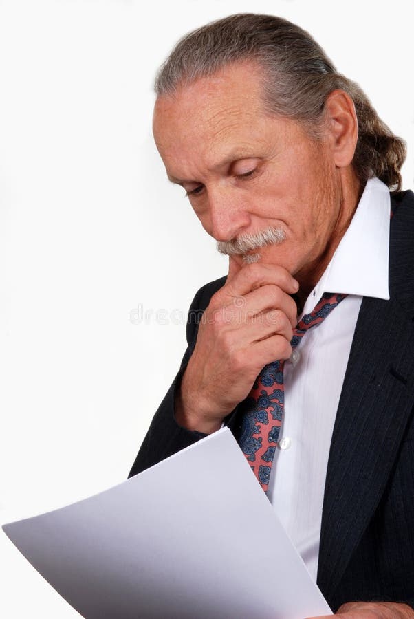 Business man review papers stock photo. Image of review - 23763846