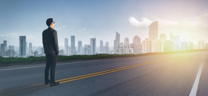 Business Man on the Road Think Analysis To Use a Strategy , Vision To ...