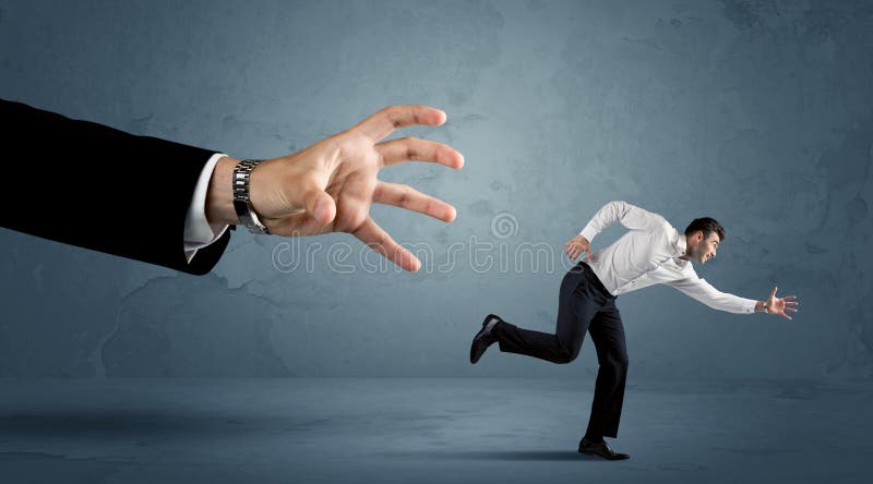 Business Man Running Away from a Huge Hand Concept Stock Photo - Image ...