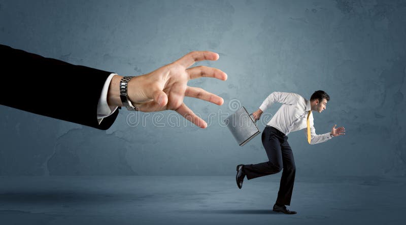 Business Man Running Away from a Huge Hand Concept Stock Photo - Image ...