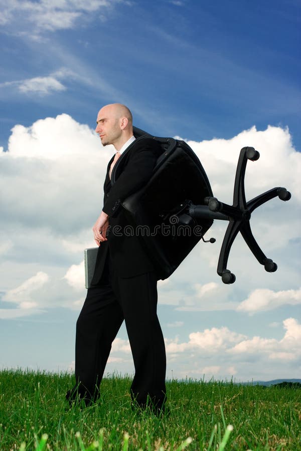 Businessman Staying and Offering Stuffs To a Huge Bull Shadow Stock ...