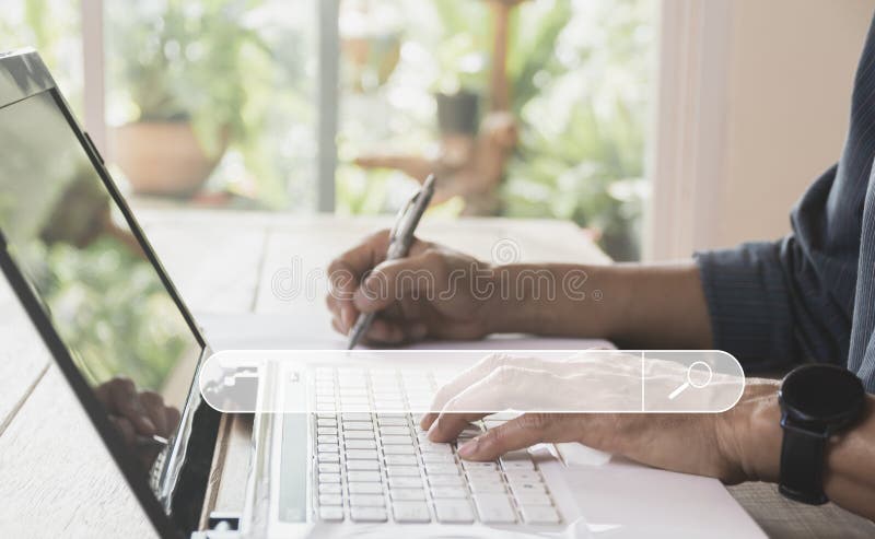 Business Man Searching and Working with Computer Laptop on Table at ...