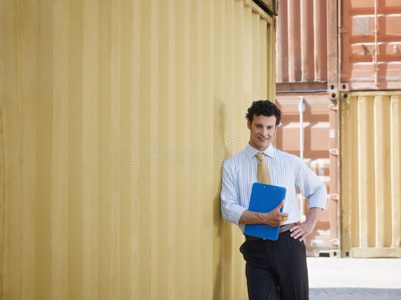 Business Man with Shipping Containers Stock Photo - Image of checklist ...