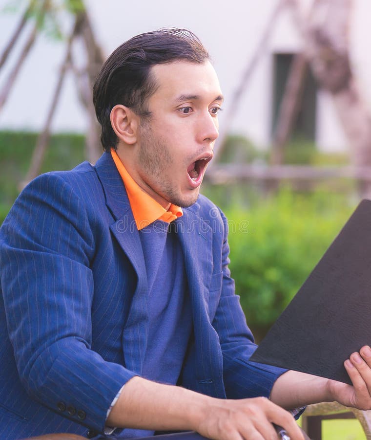 Business Man Shocking Looking at Tablet Notepad Stock Image - Image of ...